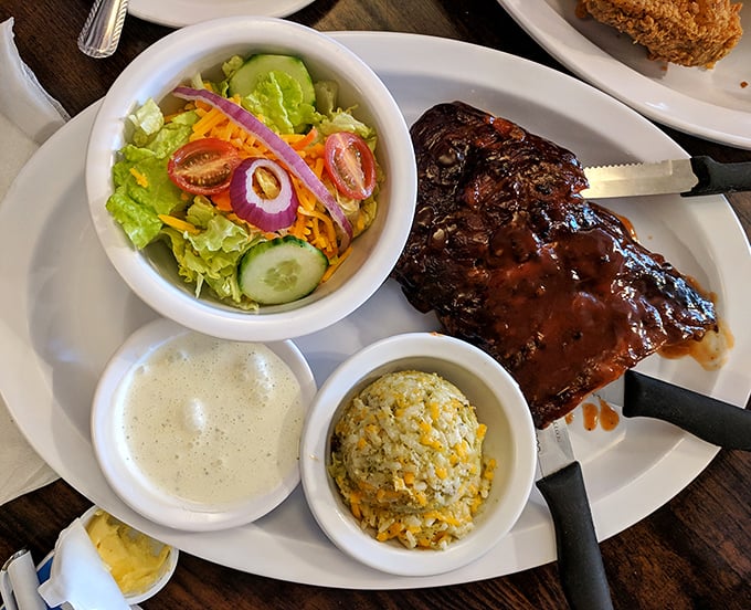 Ribs so tender they practically leap off the bone. That sauce has the perfect sticky-sweet-tangy balance that haunts barbecue dreams.