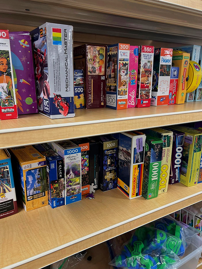 Puzzle paradise! Where 1000-piece challenges sit patiently boxed, waiting for rainy days and determined minds to bring them to life.