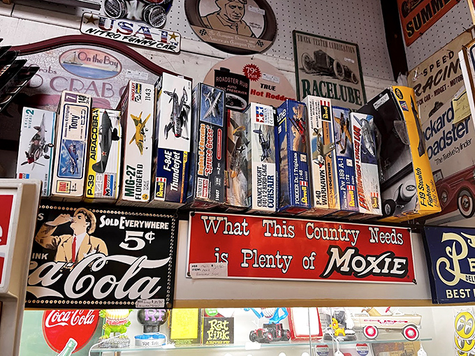 Vintage advertising signs and model kits line the walls, proving that "What This Country Needs is Plenty of Moxie" &ndash; and nostalgia.