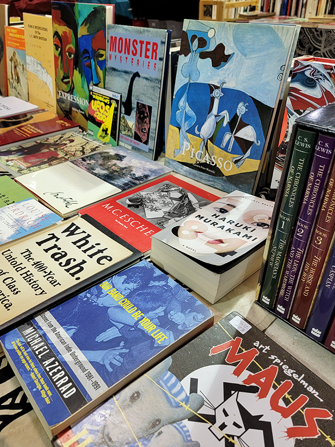 Literary treasures await the patient browser, from Picasso art books to Murakami novels, proving the flea market feeds minds as well as decorating obsessions.