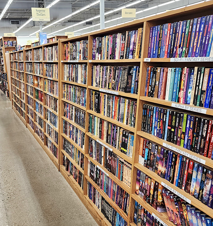 The science fiction and fantasy section stretches toward infinity, much like the universes contained within these affordable paperback portals.