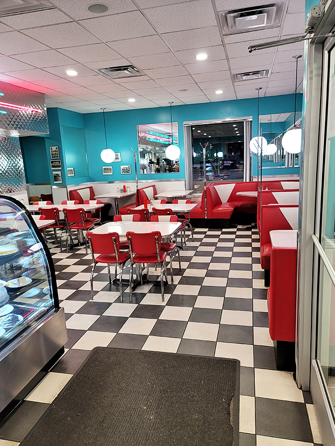 The dining room isn't just decorated&mdash;it's curated, with every checkered tile and red booth contributing to the time-travel experience.