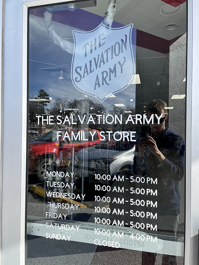 The store hours, clearly displayed like a promise. Six days a week of bargain hunting possibilities, with Sundays reserved for counting your savings.