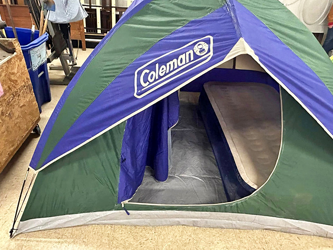 This gently used Coleman tent holds camping memories from someone else's summer adventures, now available for your own outdoor stories.
