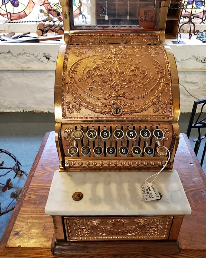 This ornate brass cash register isn't just a beautiful antique&mdash;it's a mechanical marvel that rang up purchases long before "chip readers" and "contactless payment."