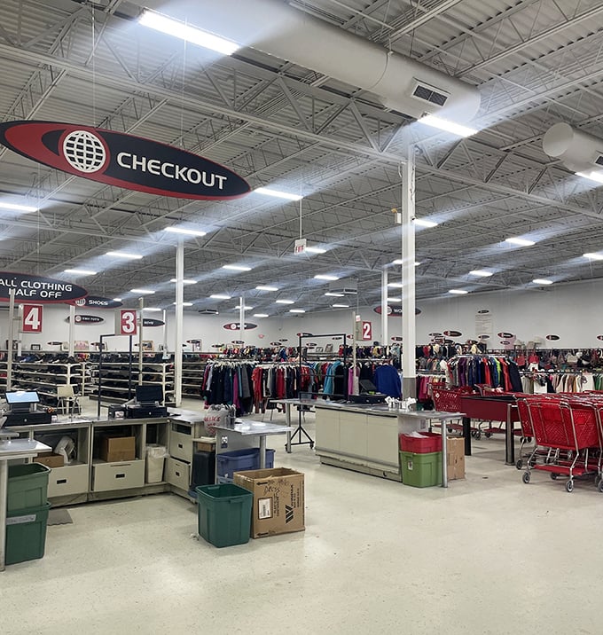 The checkout area: retail's finish line where victory comes in the form of red shopping carts filled with treasures and savings.