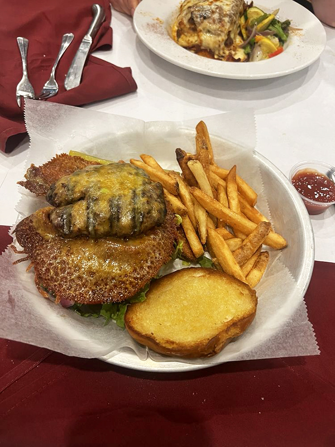 Not all cheeseburgers wear capes, but this golden-crusted beauty with melted cheese and perfect fries might just save your day.