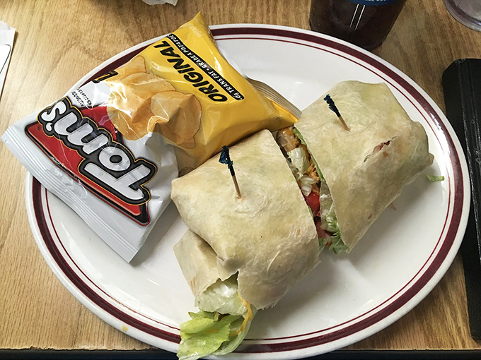 A hearty wrap with chips on the side&mdash;lunch in its most practical form. No Instagram filters needed when flavor does all the talking.