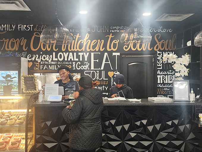 Behind this counter, culinary magic happens daily, with the restaurant's motto "From Our Kitchen to Your Soul" promising more than just a meal.