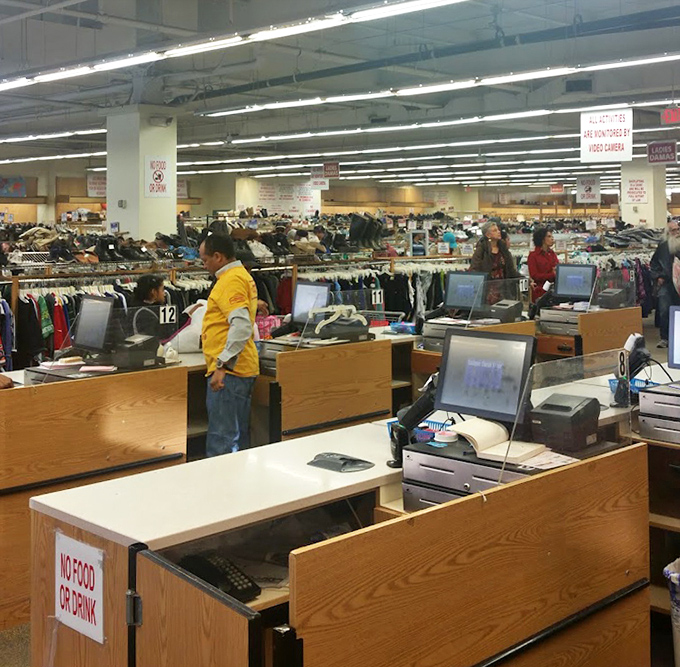The checkout area - final frontier of the thrift store journey, where $25 can transform a cart of castoffs into a wardrobe revolution.