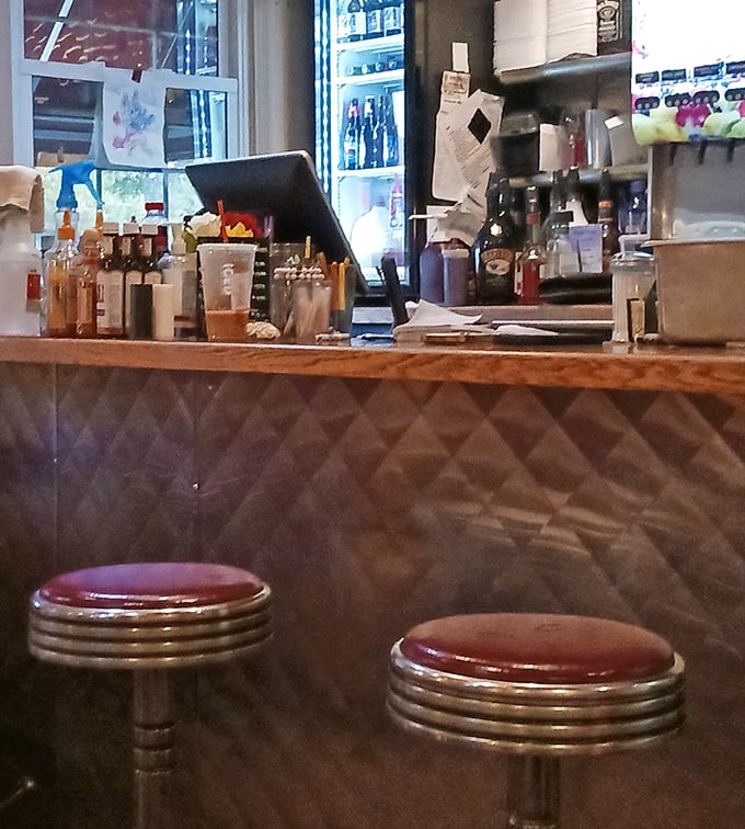 The counter area&mdash;command central for coffee refills and the place where diner magic happens behind the scenes.