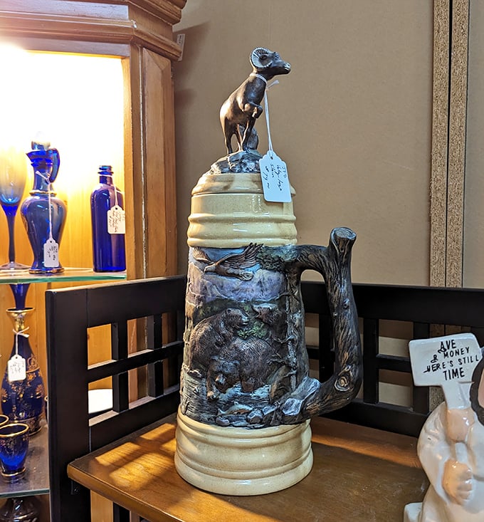 This isn't just a beer stein; it's a conversation starter with a dog on top. German craftsmanship meets whimsical design for your beverage enjoyment.