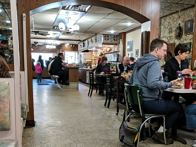 Morning light streams in as diners fuel up for the day ahead. Some come for the food, but return for the community.