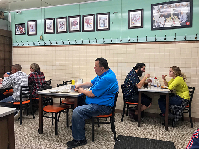 The democratic dining room where auto workers, executives, and tourists all speak the universal language of "two up with everything."