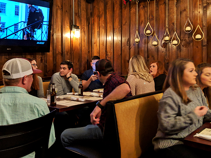 The dining room buzzes with the energy of people united in the universal language of good food and better company.