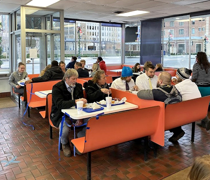 Where strangers become regulars and regulars become family. The orange booths have heard every story Findlay has to tell.