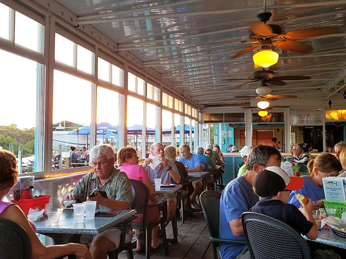 Where locals and visitors break bread together. The real Florida isn't at theme parks&mdash;it's in these conversations happening over grouper sandwiches.