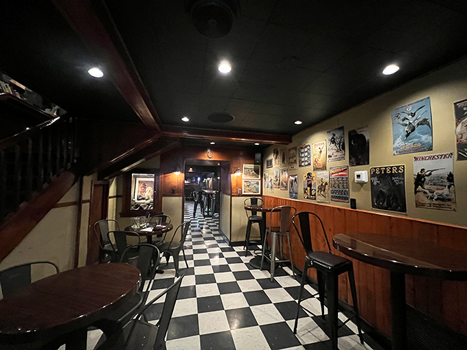 Black and white checkered floors lead to a dining area where hunting memorabilia tells stories of North Dakota's outdoor heritage.