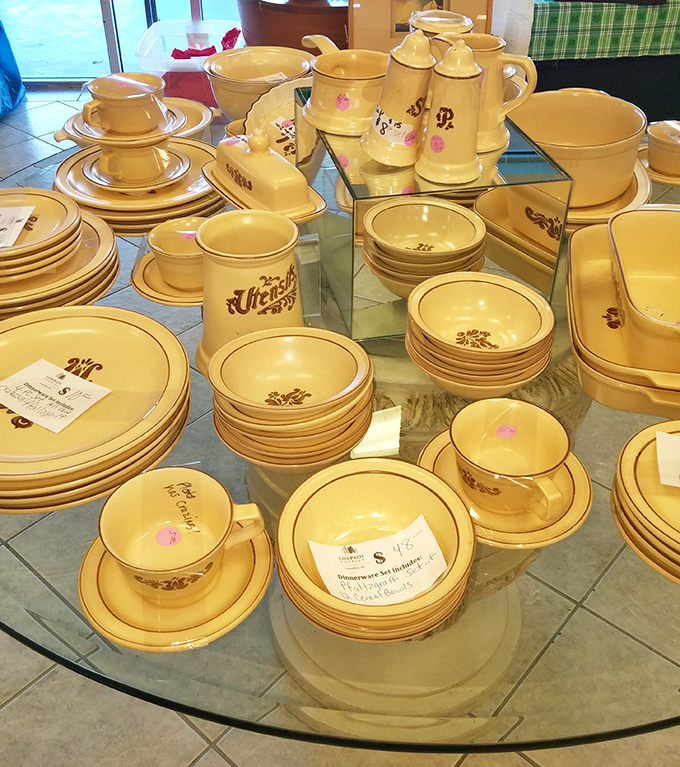 Vintage dinnerware sets that could star in a period drama await new dinner parties. These butter-yellow dishes have hosted countless family meals.