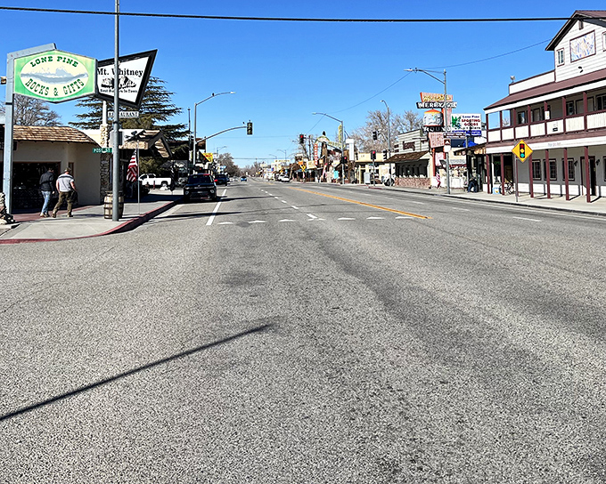 Morning light bathes the Eastern Sierra in amber warmth, turning a simple street corner into a moment of unexpected beauty.