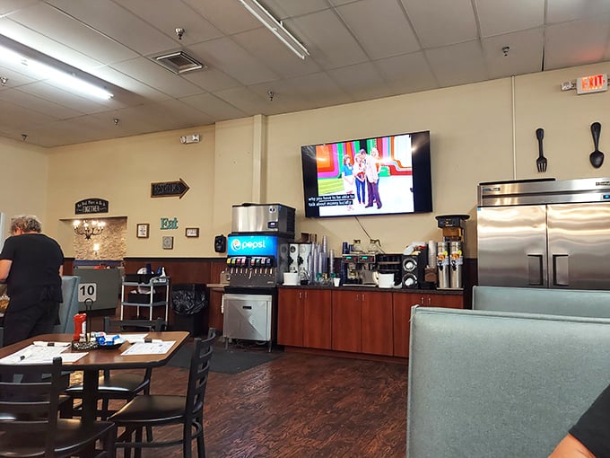 The drink station and TV corner&mdash;where you can catch up on the news while deciding between regular or diet. Life's big decisions.