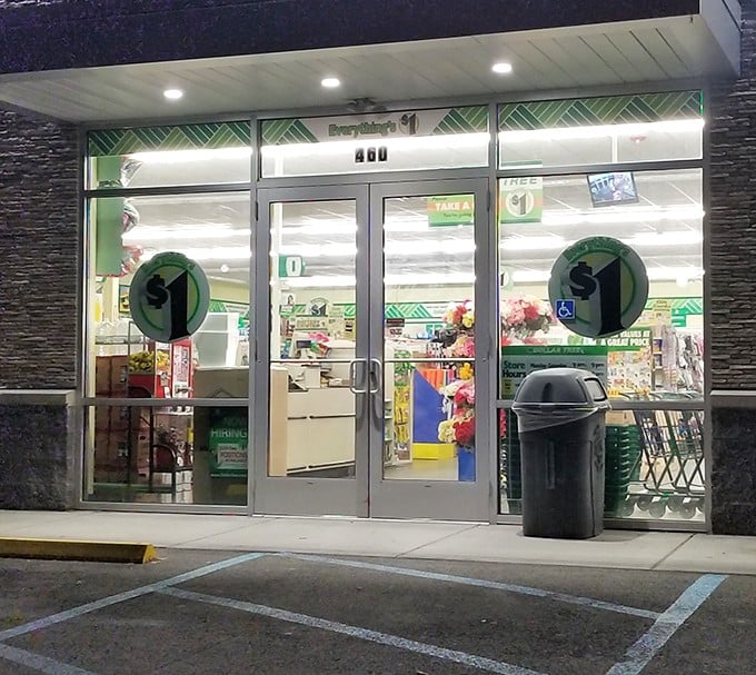 Night-time treasure hunting at its finest. The illuminated entrance beckons like a budget-friendly lighthouse guiding shoppers to safe harbor.