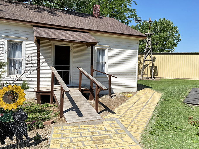 The entrance to Dorothy's house beckons visitors down its yellow brick path. No tornado required for this Kansas-to-Oz journey.