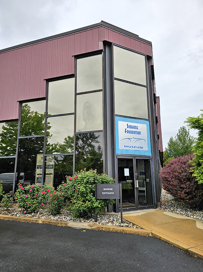 The museum entrance beckons car enthusiasts and the merely curious alike &ndash; promising mechanical wonders behind its modest fa&ccedil;ade.