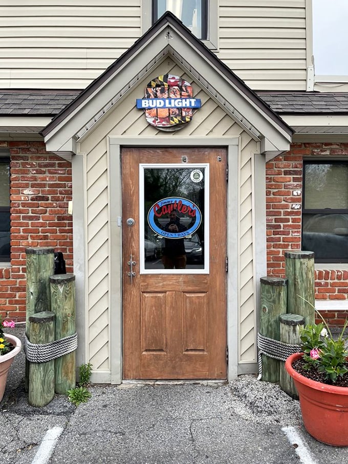 The entrance that says "Bud Light and blue crabs" louder than any neon sign ever could.