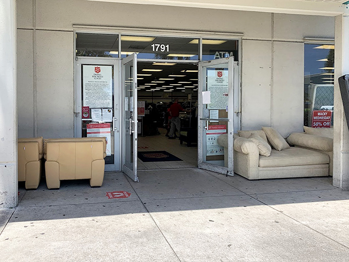 The entrance says it all—furniture sometimes can't wait to get inside, lounging by the door like hopeful pets at an adoption center.