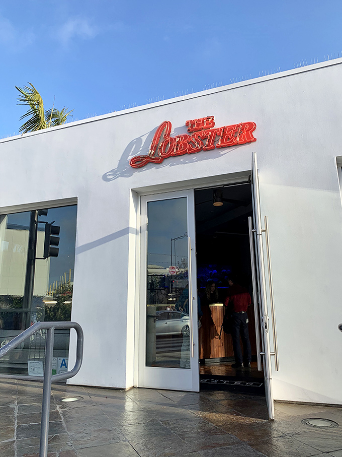 The iconic red neon sign beckons seafood lovers like a maritime siren song&mdash;resistance is both futile and unnecessary.