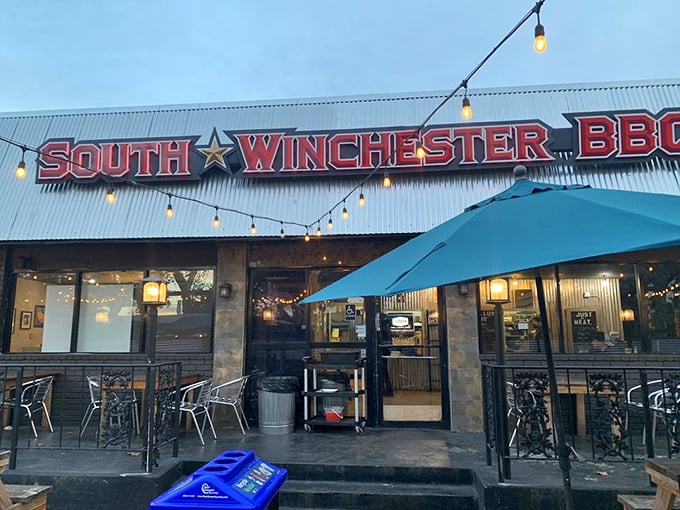 As dusk falls, the illuminated sign becomes a beacon of hope for the hungry &ndash; string lights adding that touch of magic to an already enchanted barbecue experience.