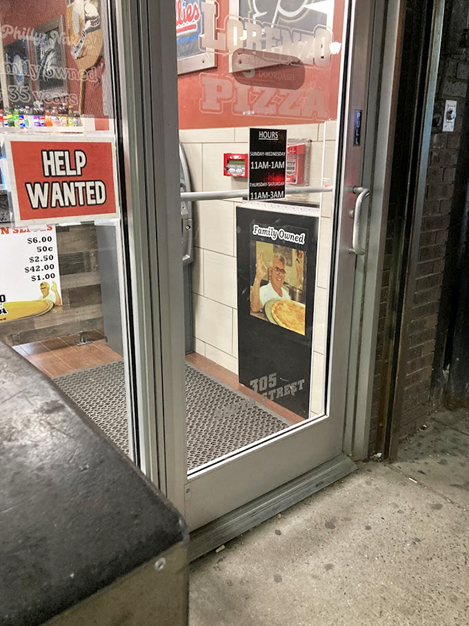 The entrance to pizza paradise, where hours extend into the wee morning to satisfy late-night cravings.