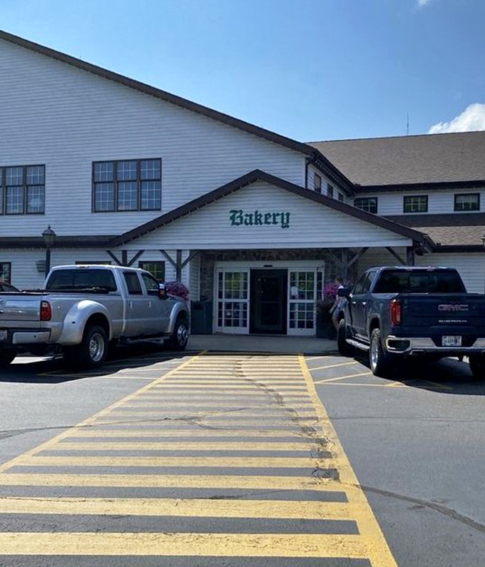The bakery entrance promises treasures within – pies, breads, and pastries that have launched a thousand detours off the highway.