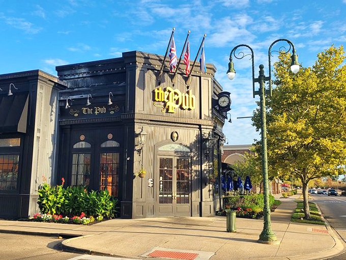 The entrance beckons like a portal to another world. Those flags aren't just decoration; they're a promise of international flavor.