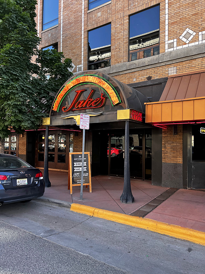 The entrance to Jake's stands ready to welcome you into its warm embrace, like a friend who always has room at their table.