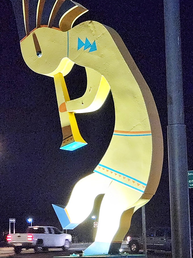After dark, strategic lighting transforms our golden friend into a mystical nighttime sentinel guiding weary interstate travelers.