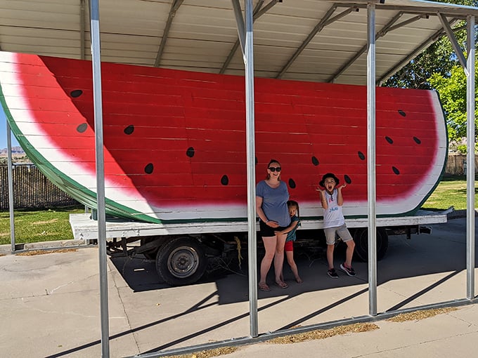 Family vacation memories in the making: "Remember that time we posed with that enormous watermelon in the middle of nowhere?"