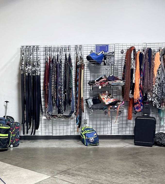 The accessories wall &ndash; where belts, ties, and scarves hang like colorful possibilities waiting to transform outfits from ordinary to interesting.