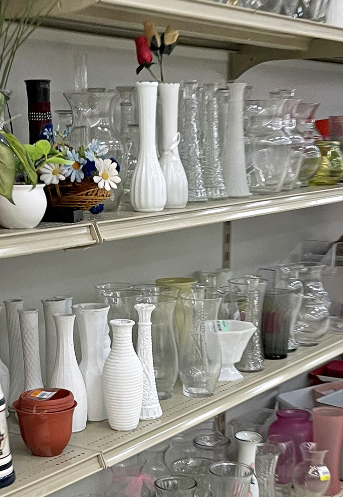 Delicate glassware and vases await new windowsills to grace. Someone's wedding gift becomes your dining table centerpiece for pocket change.
