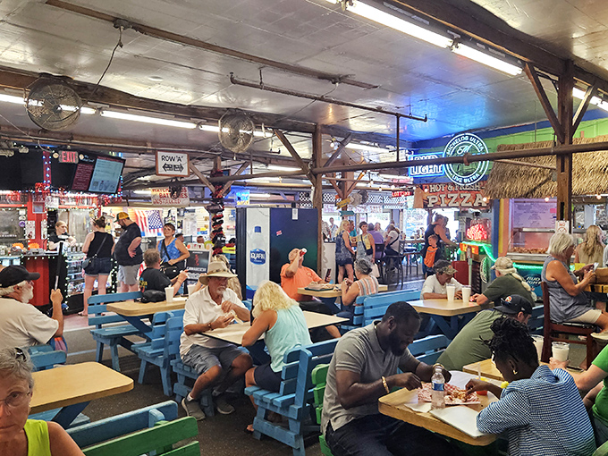 The bustling food court: where treasure hunters refuel and compare their finds over plates of delicious market fare.