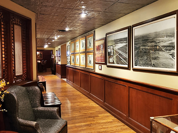 The hallway gallery serves as Phoenix's family album—each photograph a chapter in the story of how desert became metropolis.