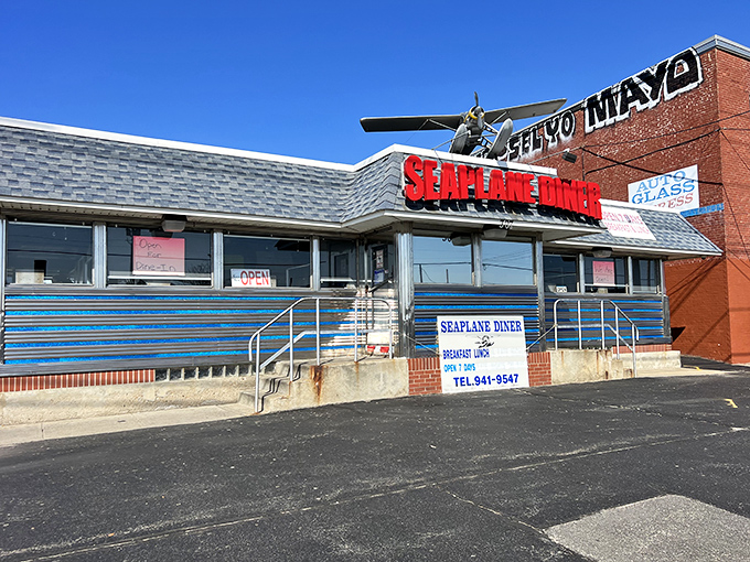 The Seaplane Diner stands proud against a clear blue sky, its vintage charm and no-nonsense approach to good food drawing hungry pilgrims daily.