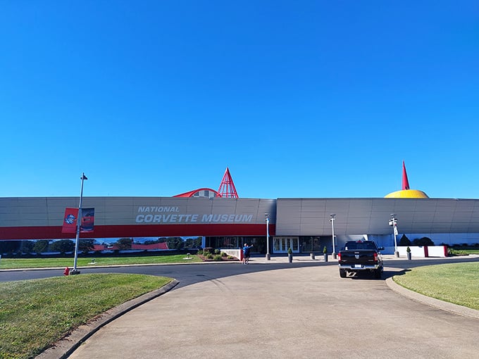 The museum's entrance welcomes visitors with its distinctive architecture. Like the cars inside, even the building refuses to be ordinary.