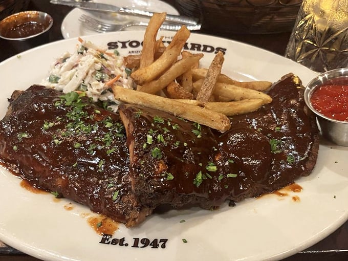Ribs glazed to such a magnificent shine they could double as mirrors. The kind of dish that makes you thankful for evolution giving us opposable thumbs.