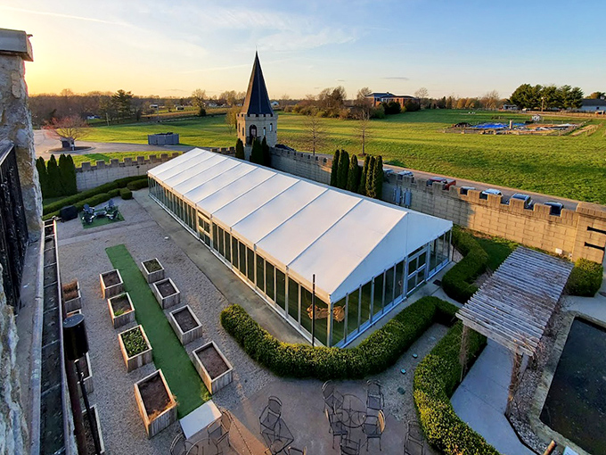 Garden beds and a greenhouse tent reveal the castle's farm-to-table philosophy &ndash; medieval aesthetics with thoroughly modern, delicious intentions.