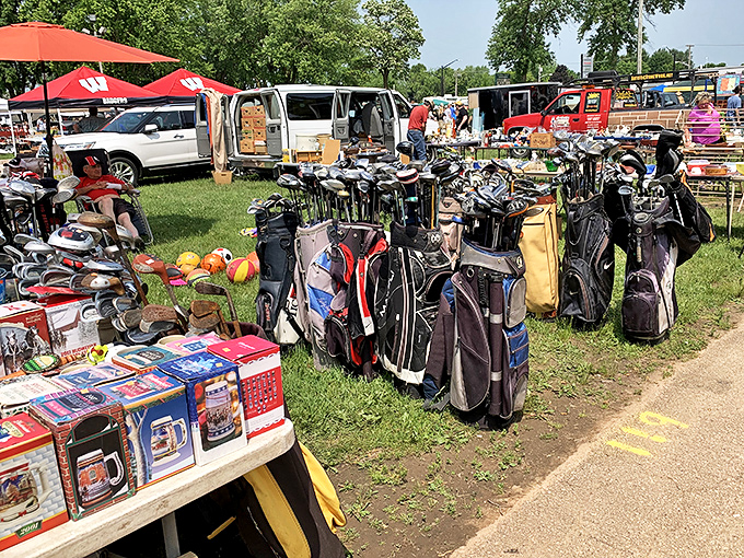 Golf bags standing at attention like retired athletes not quite ready to quit. Each club has its story of triumphant drives and embarrassing slices waiting for its next chapter.