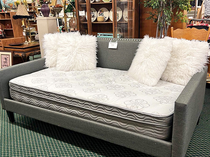 This stylish gray daybed with plush pillows isn't just furniture&mdash;it's the statement piece your living room has been texting you about.