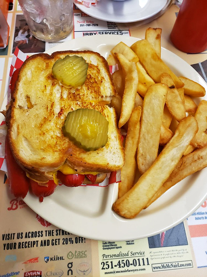 Grilled cheese with pickles and steak fries proves that sometimes the simplest pleasures in life are also the most satisfying.