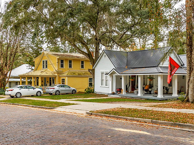 Colorful historic homes line brick streets where neighbors actually wave to each other&mdash;a refreshing throwback to communities before everyone retreated behind privacy fences. 